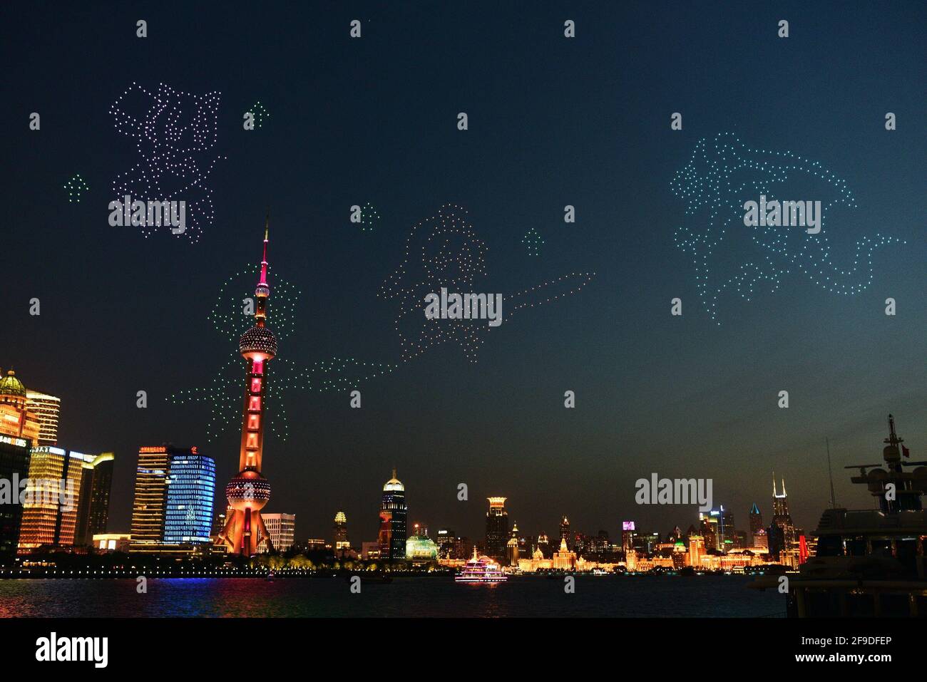 SHANGHAI, CHINA - APRIL 17, 2021 - A group of drones display the image ...