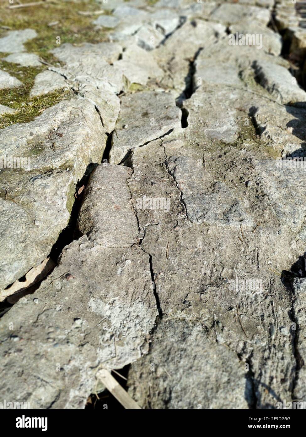 A rough rock formation texture background under a sunlight Stock Photo ...