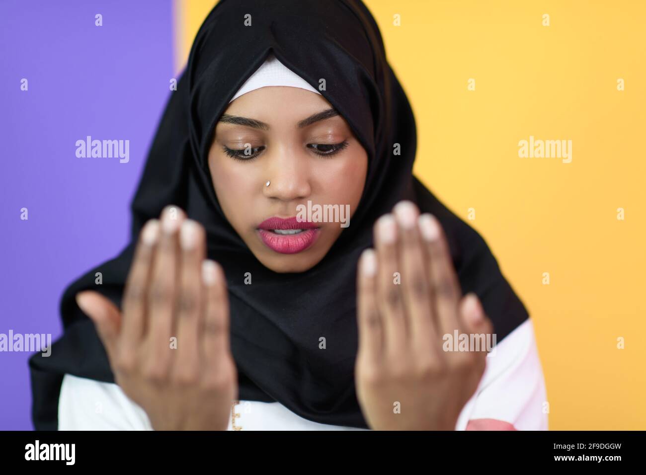 african muslim woman wearing hijab and traditional muslim clothes ...