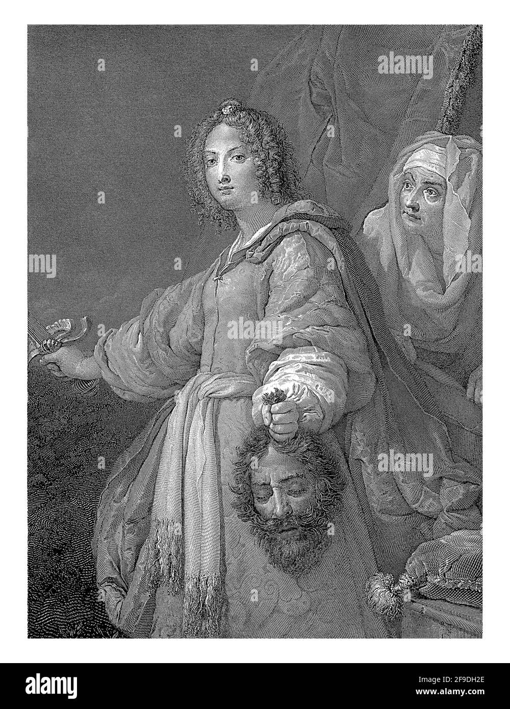 Judit stands with a sword in hand and shows the spectator the severed ...