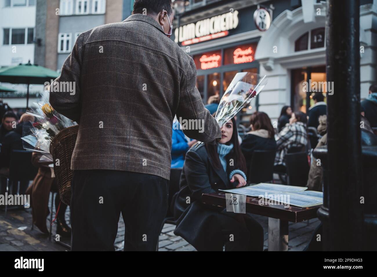 Man selling flowers in Soho area Stock Photo - Alamy