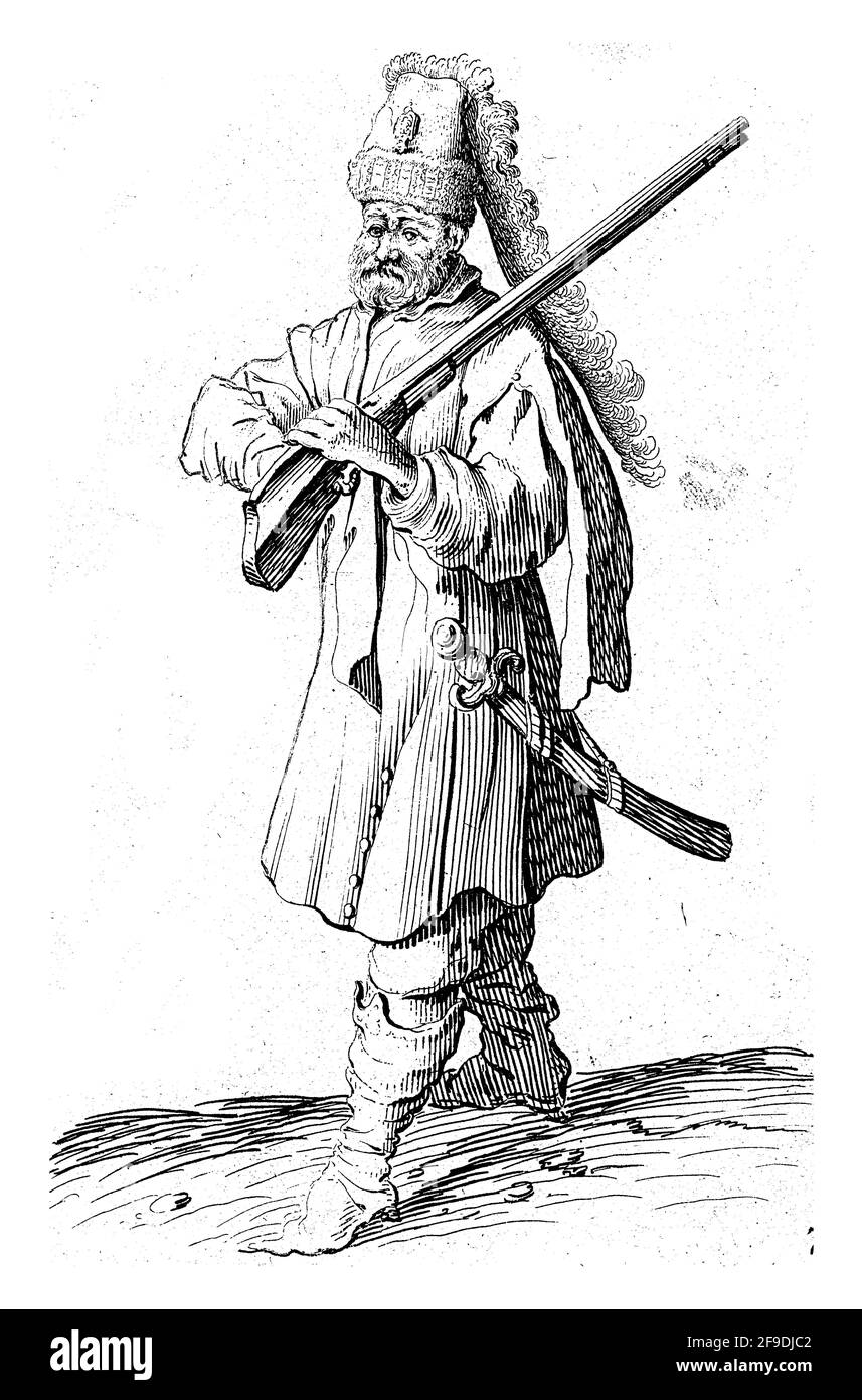 Man in oriental clothes with a musket in the hands. He wears a ...