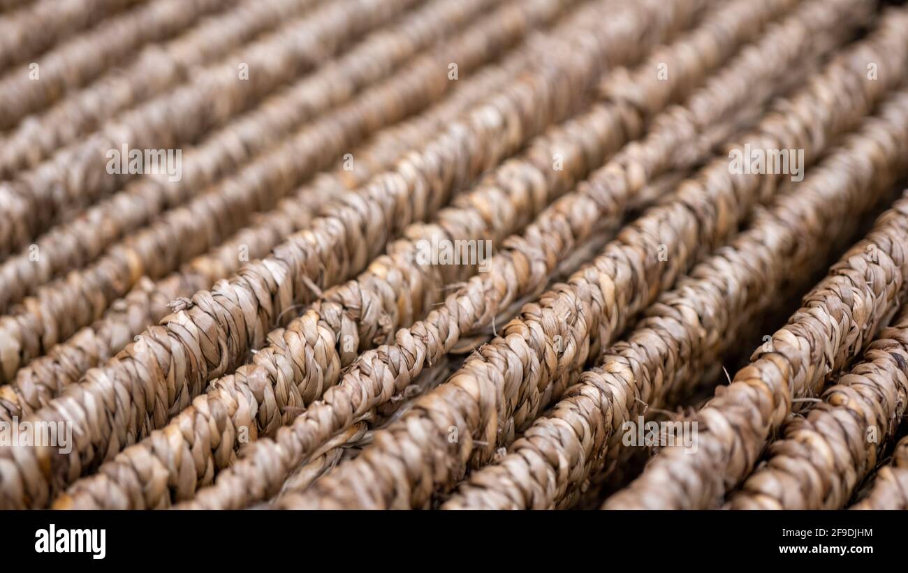Surface of woven straw mat, use as background Stock Photo - Alamy