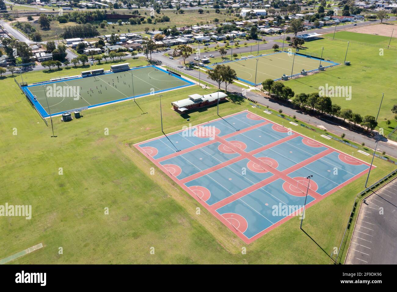 Drone aerial photograph of colourful netball courts and large sports ...