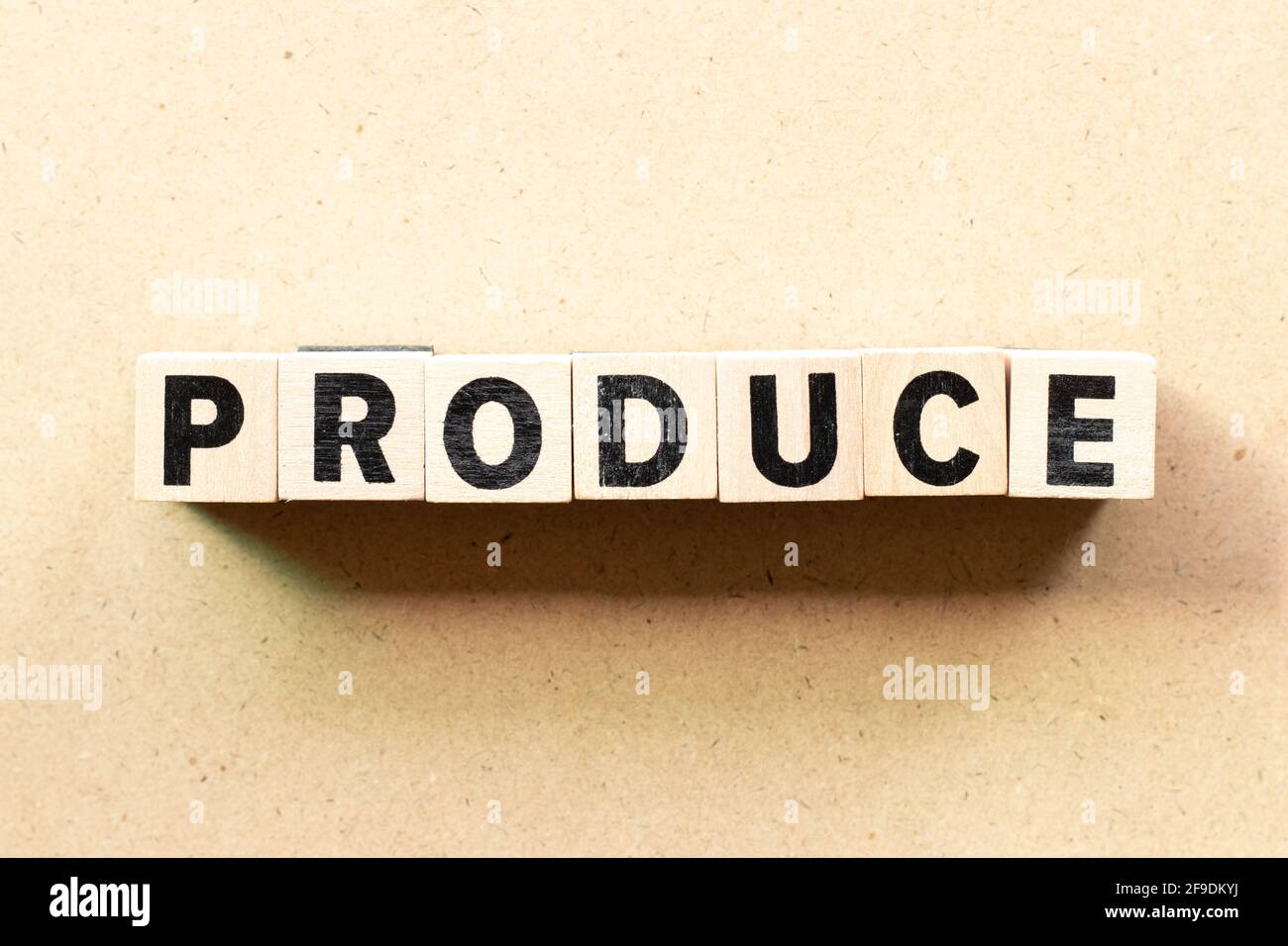 Letter block in word produce on wood background Stock Photo - Alamy