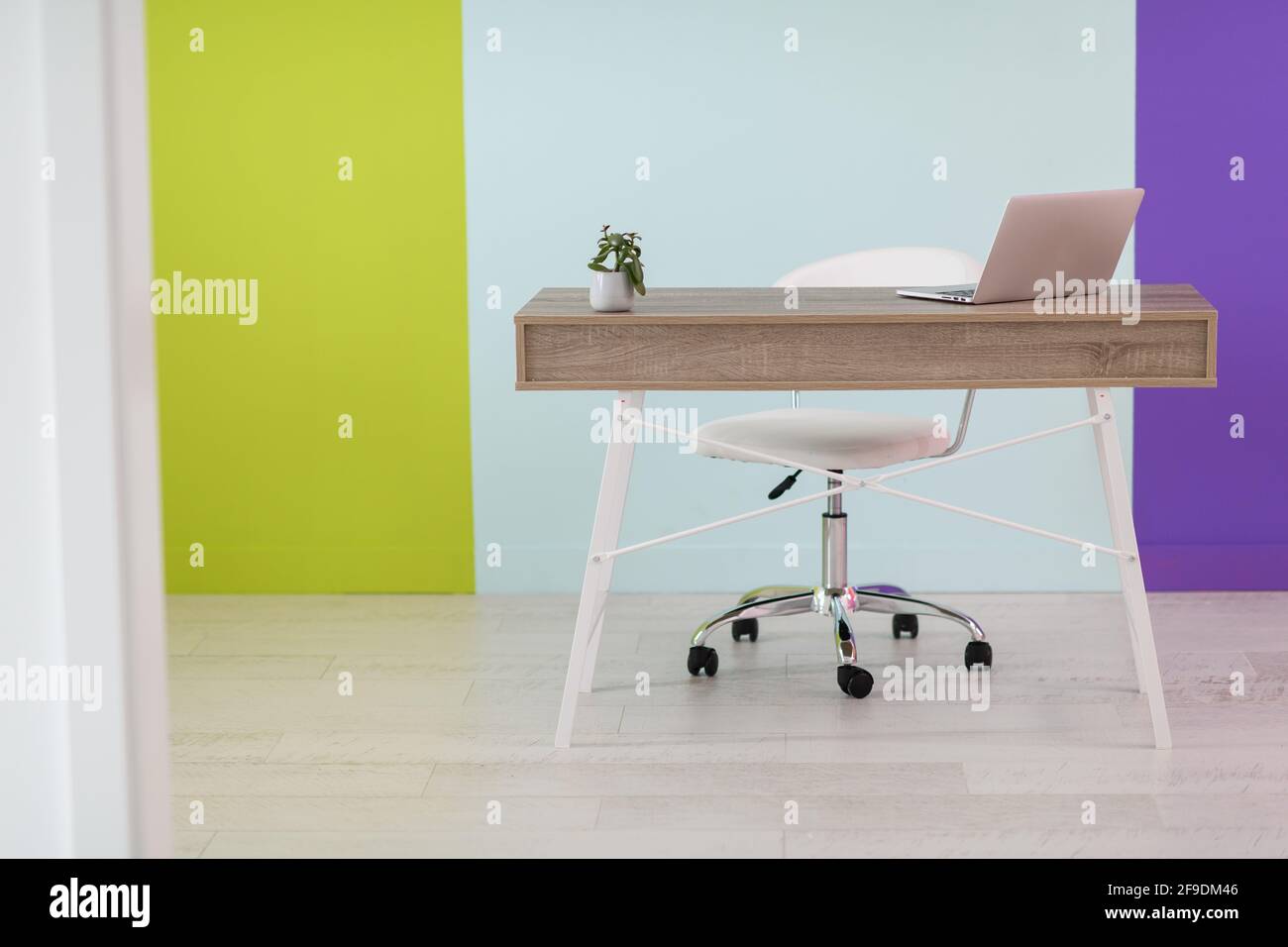 home office concept. chair, laptop, desk and flowers Stock Photo - Alamy