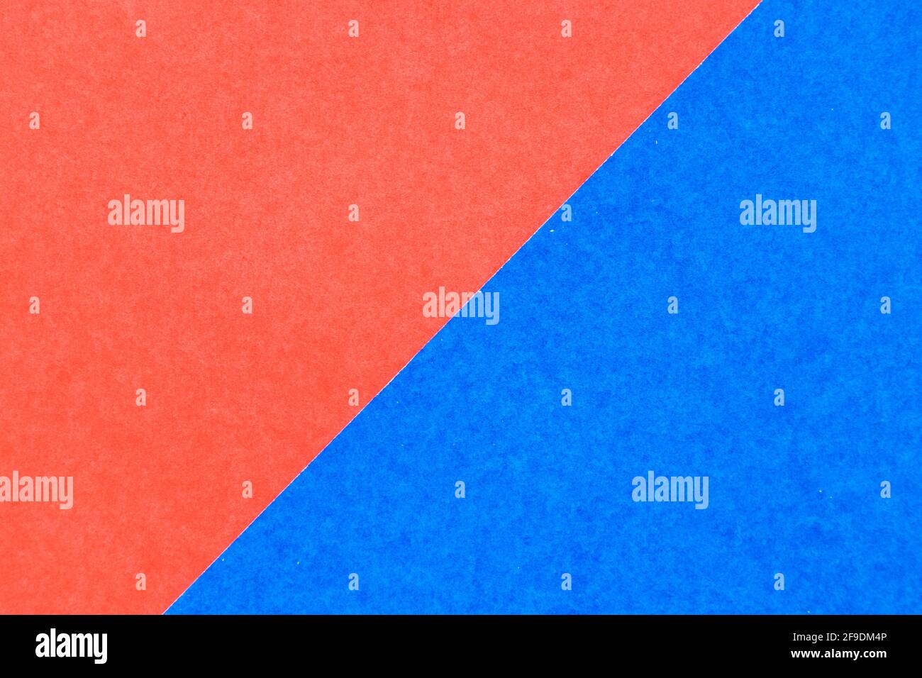 Abstract red and blue color paper textured background with copy space ...