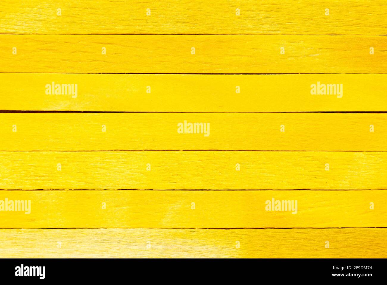 Yellow color wood plank use as textured background, frame, decoration ...