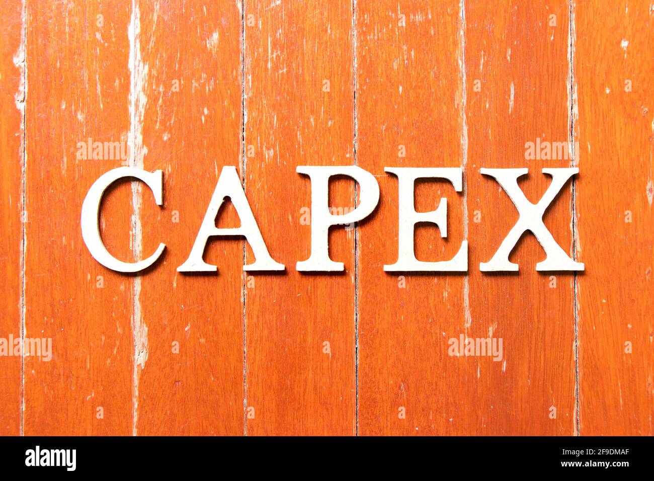 Alphabet letter in word CAPEX (Abbreviation of Capital Expenditure) on ...