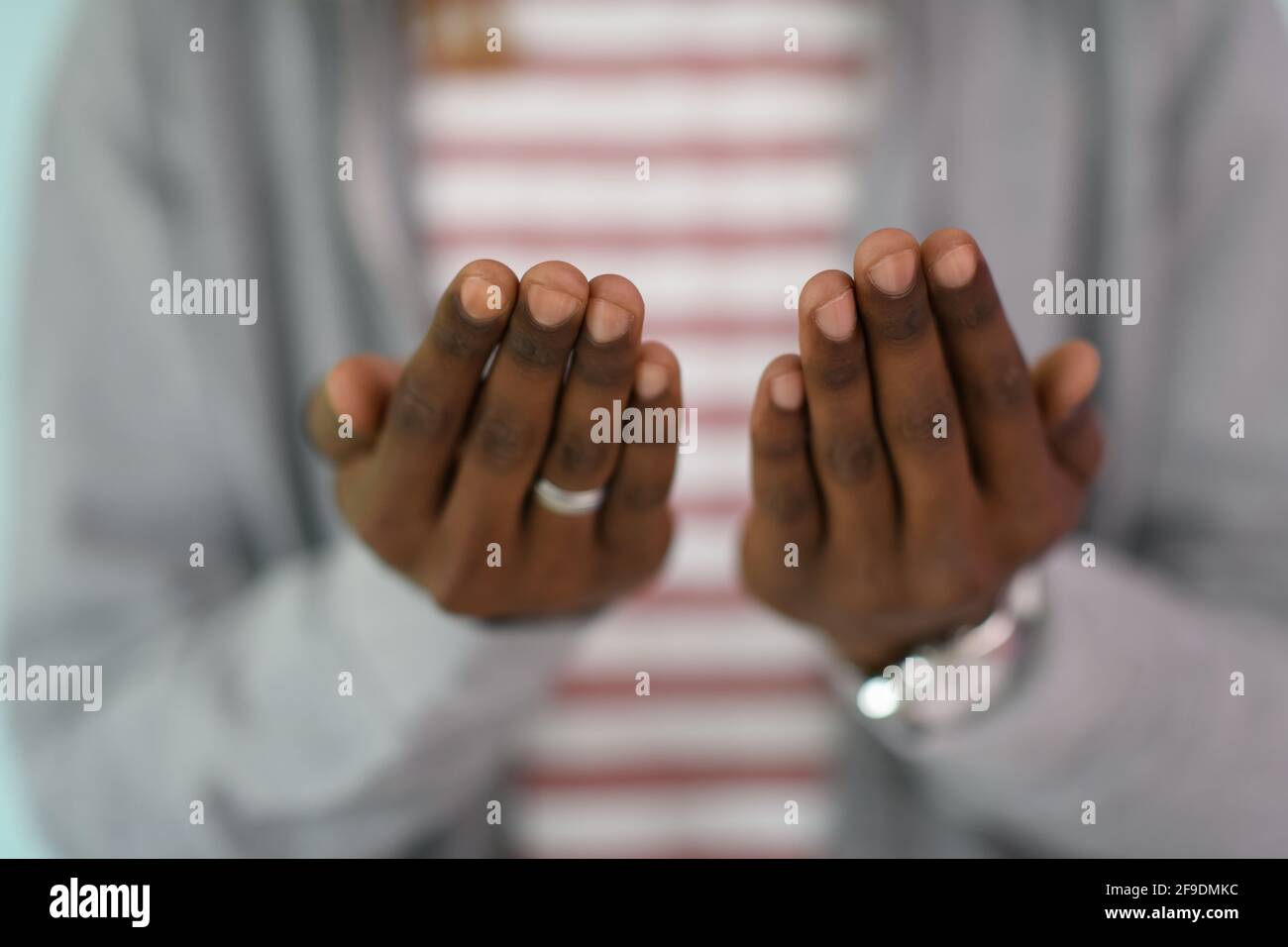 Young African Muslim Man Making Traditional Fatiha Prayer To Allah ...