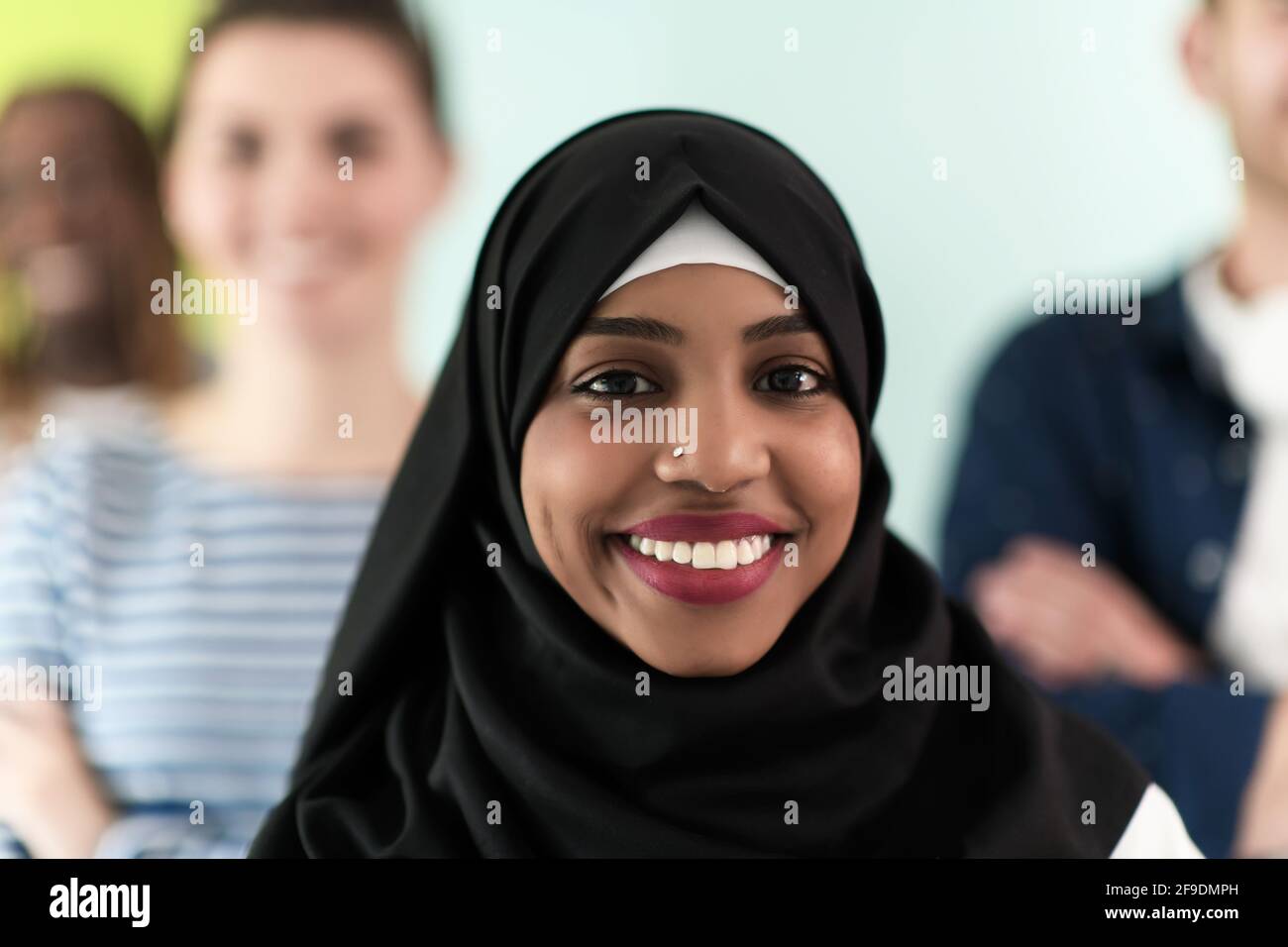 group of diverse teenagers posing in a studio, determined teenagers in ...