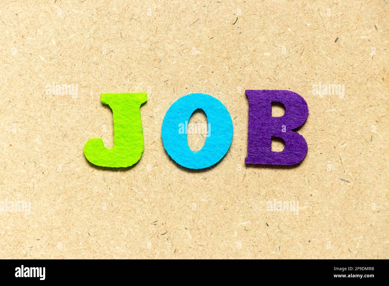 Color cloth alphabet letter in word job on wood background Stock Photo ...