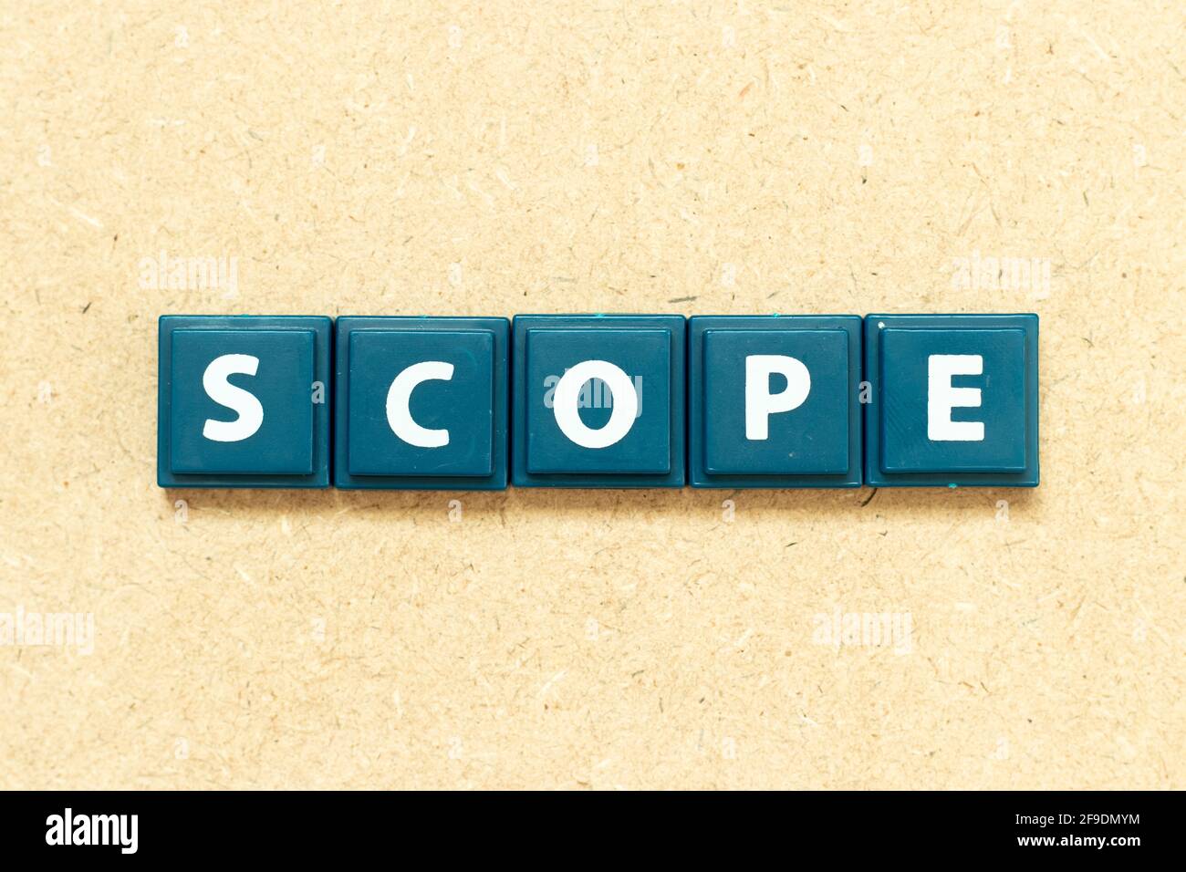 Tile alphabet letter in word scope on wood background Stock Photo - Alamy