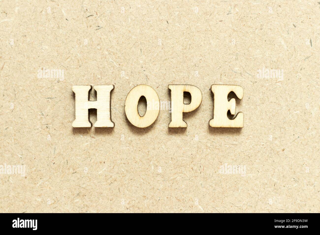Alphabet letter in word hope on wood background Stock Photo - Alamy