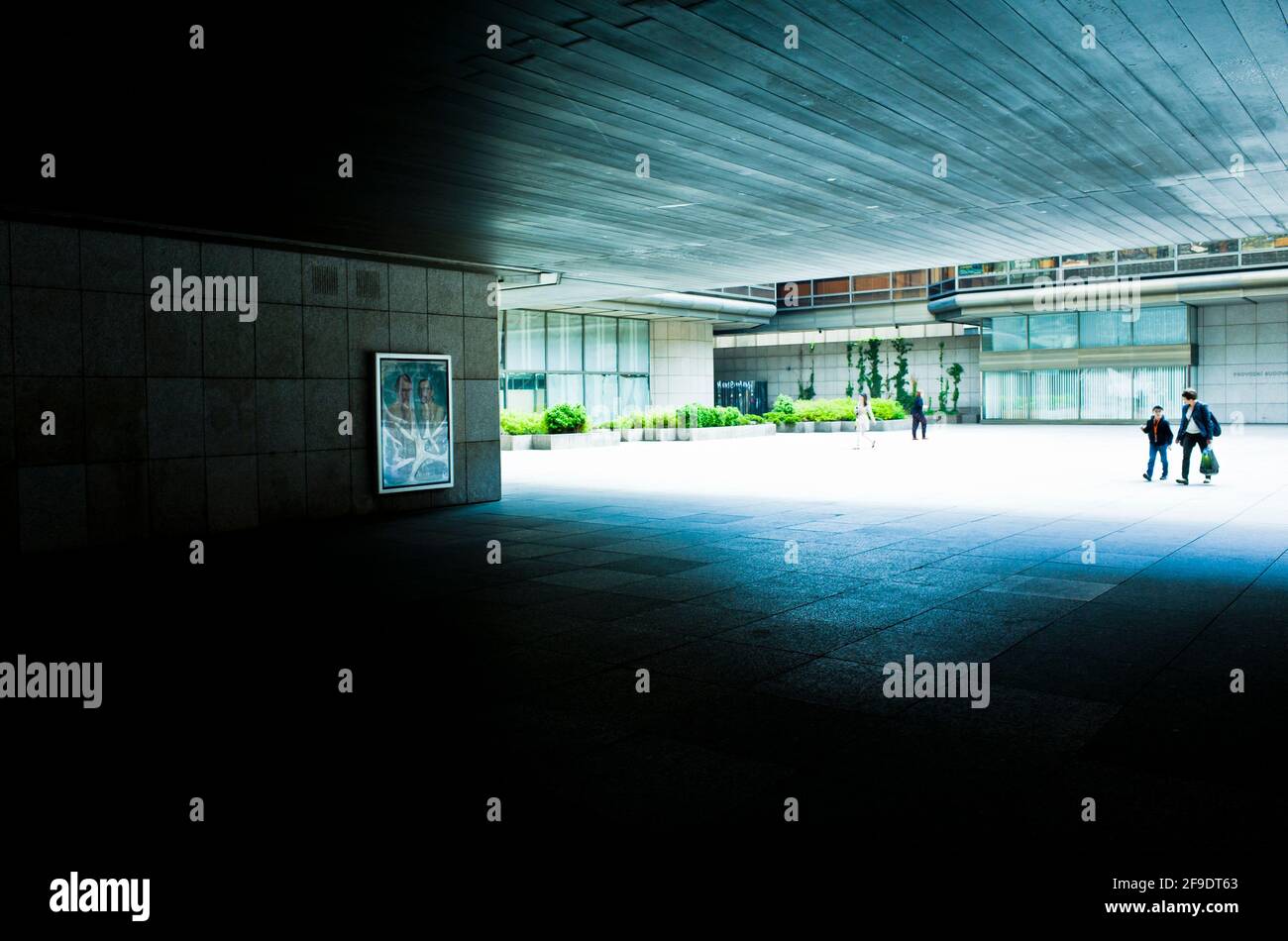 people walking outside of a building modern complex Stock Photo - Alamy