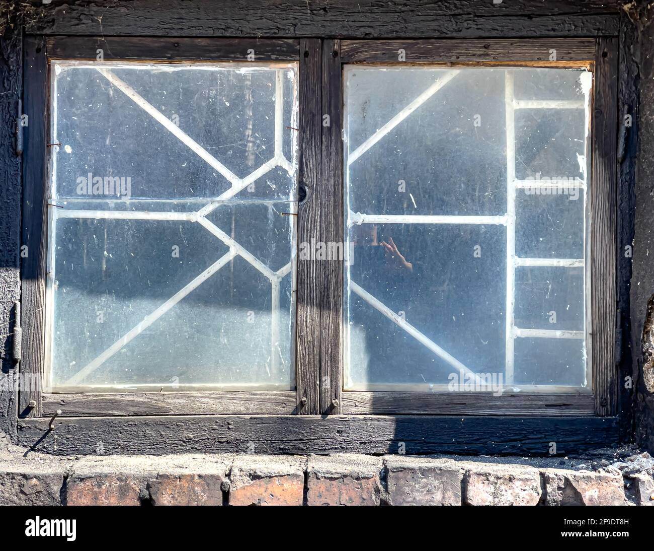 Old gloomy window in an abandoned building close up Stock Photo - Alamy