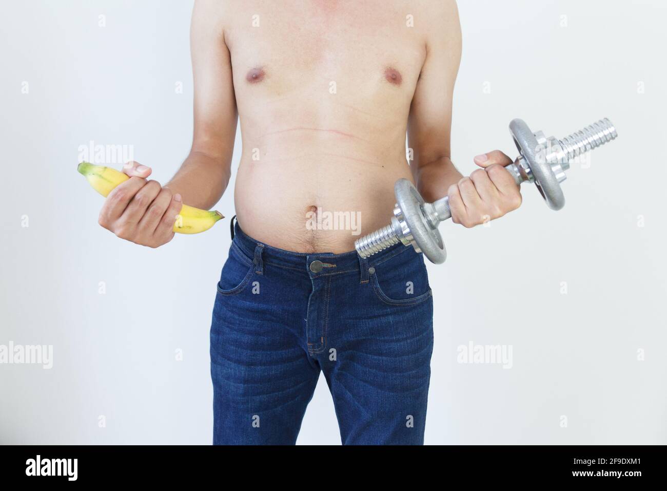 The paunchy fat man exercise for lose weight Stock Photo - Alamy