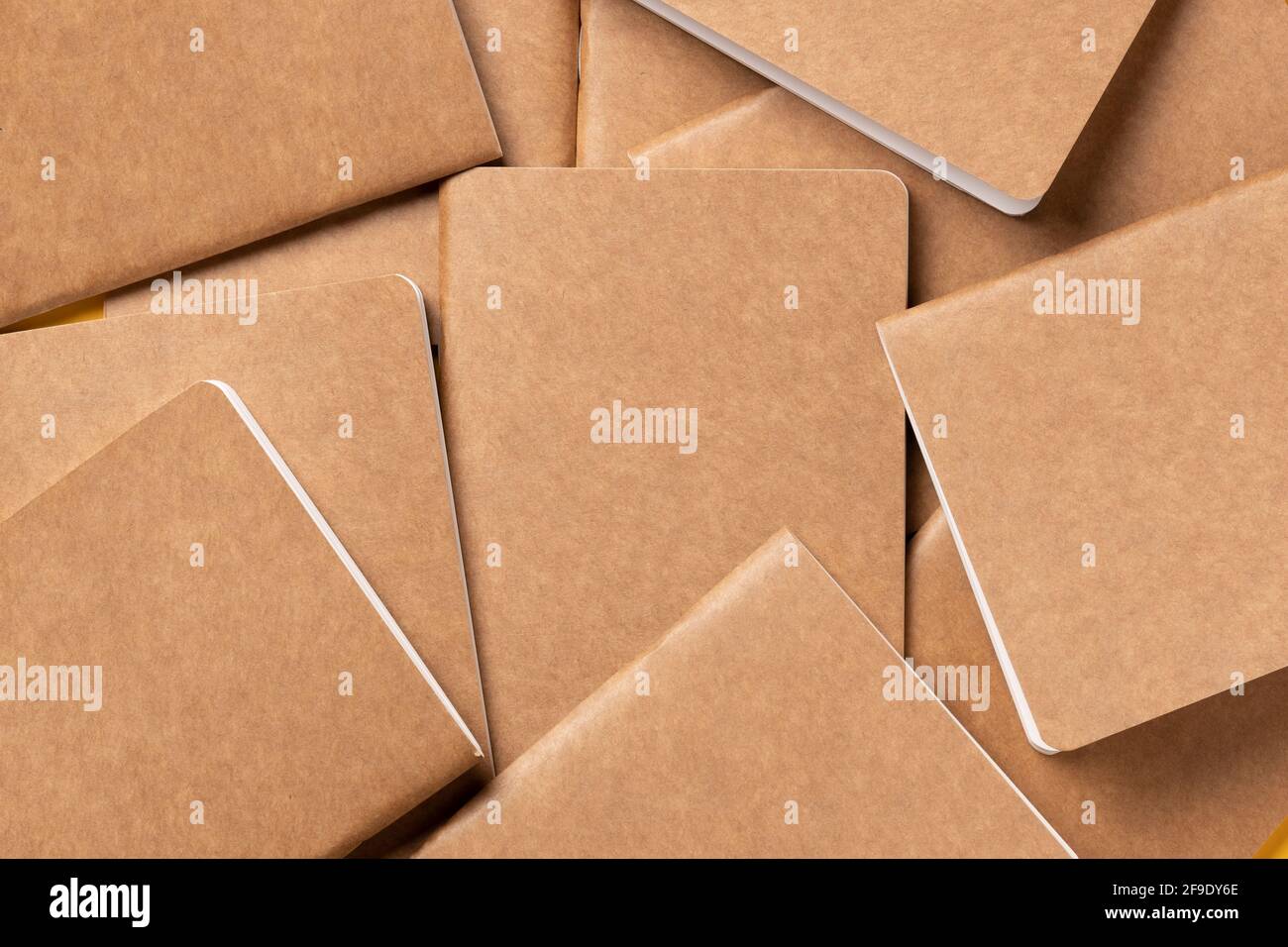 kraft brown notebook background texture.disorder alignment backdrop of ...