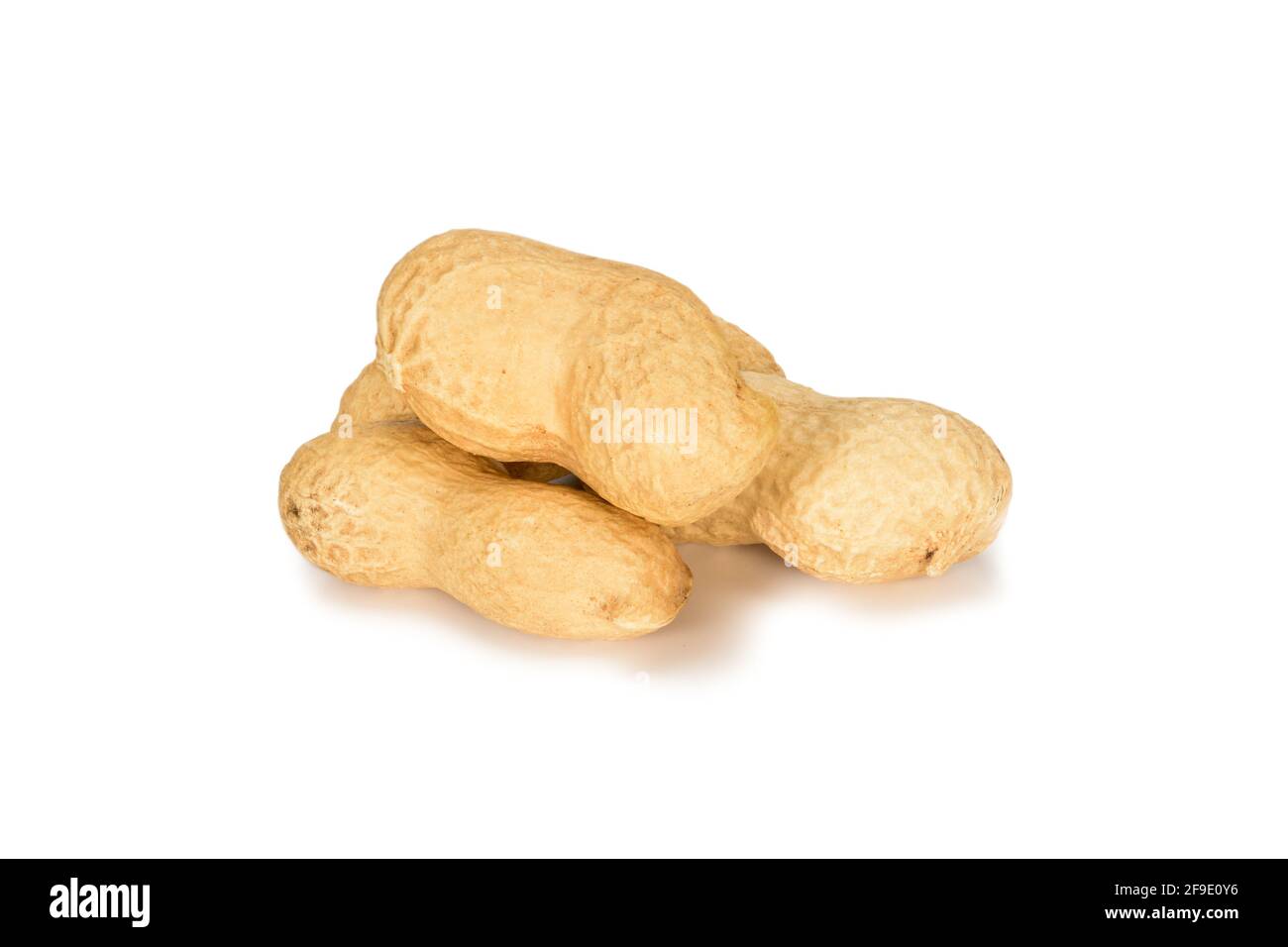 Peanuts. Four whole nuts isolated on white background. Peanut macro ...
