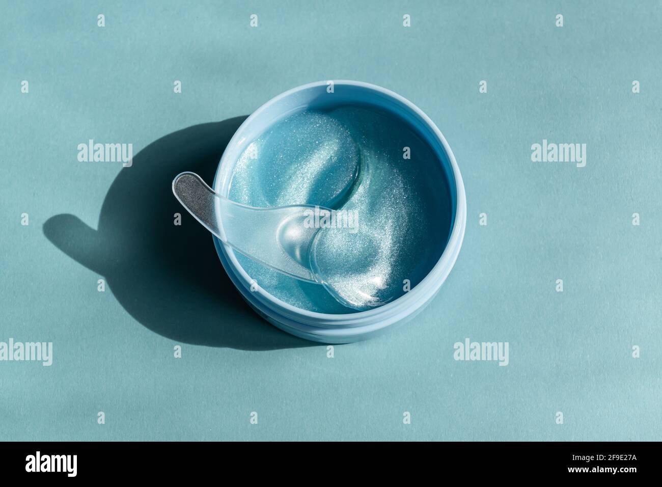 Blue collagen eye mask or patches on a blue background. Skin care and ...