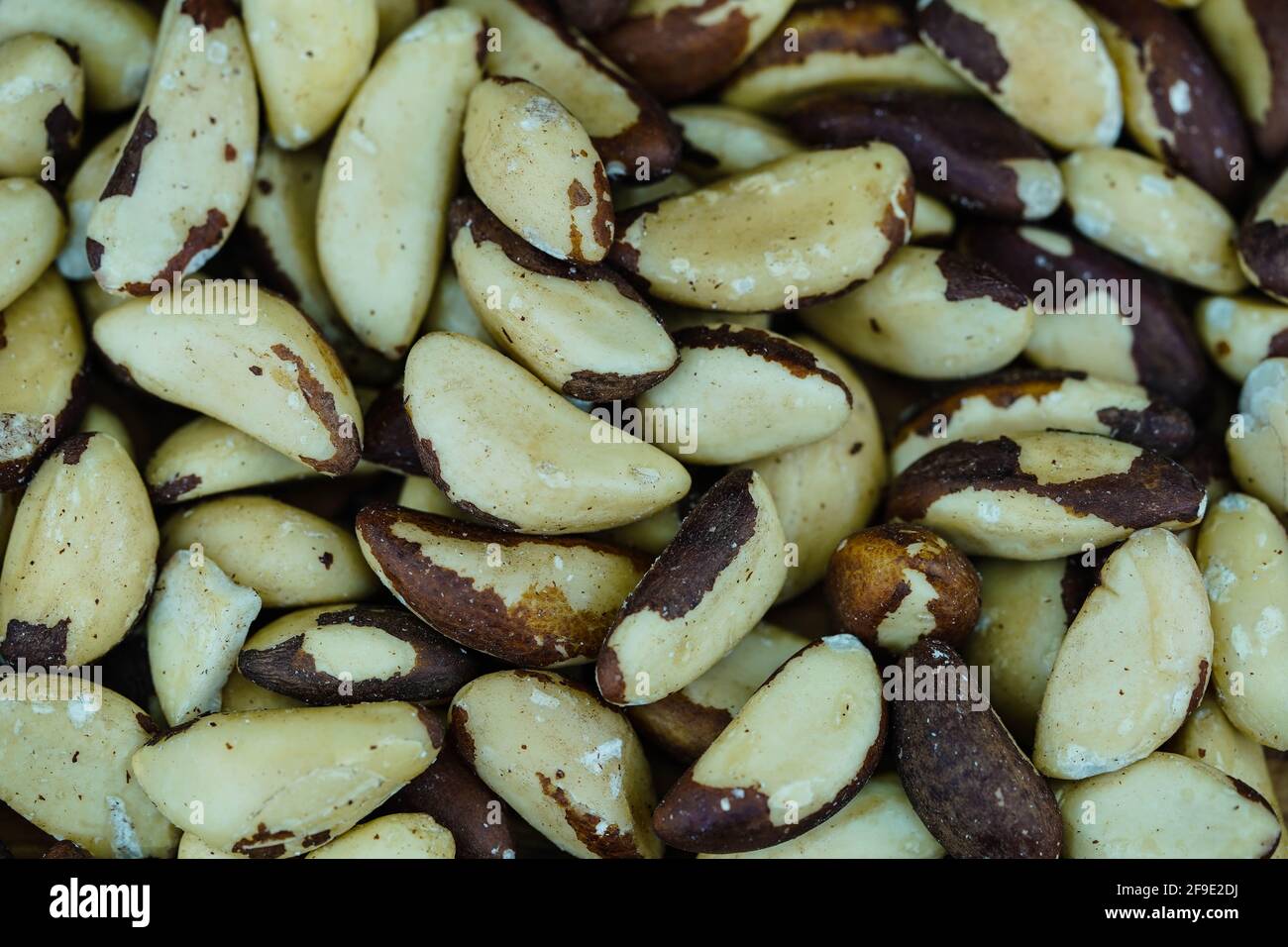 Brazil nuts on olive wood Stock Photo - Alamy