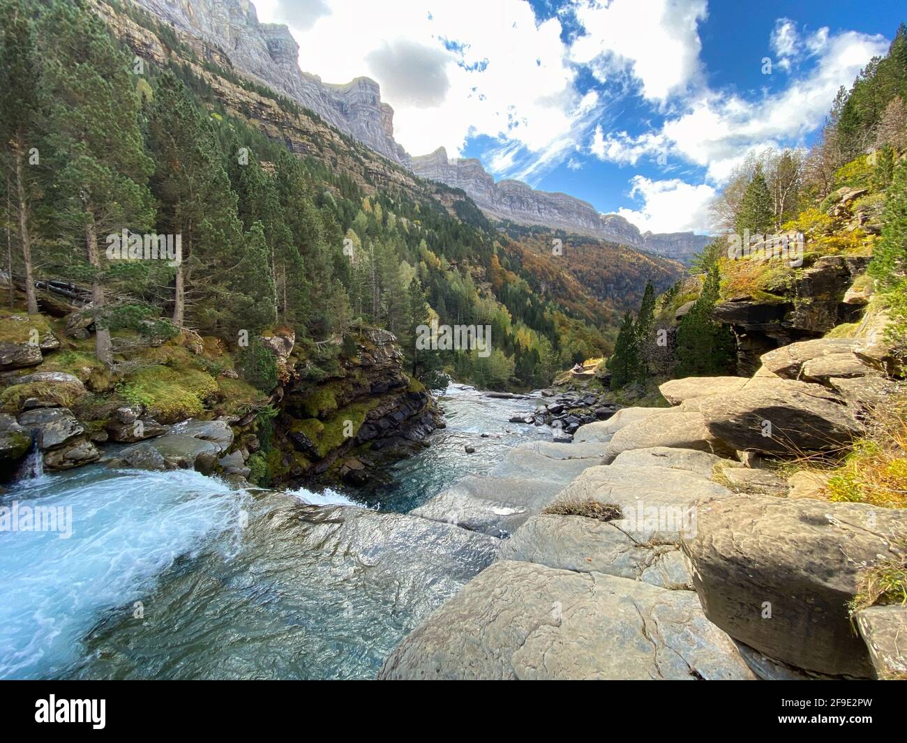 views of mountains, forests, waterfalls and natural pools in the Ordesa ...