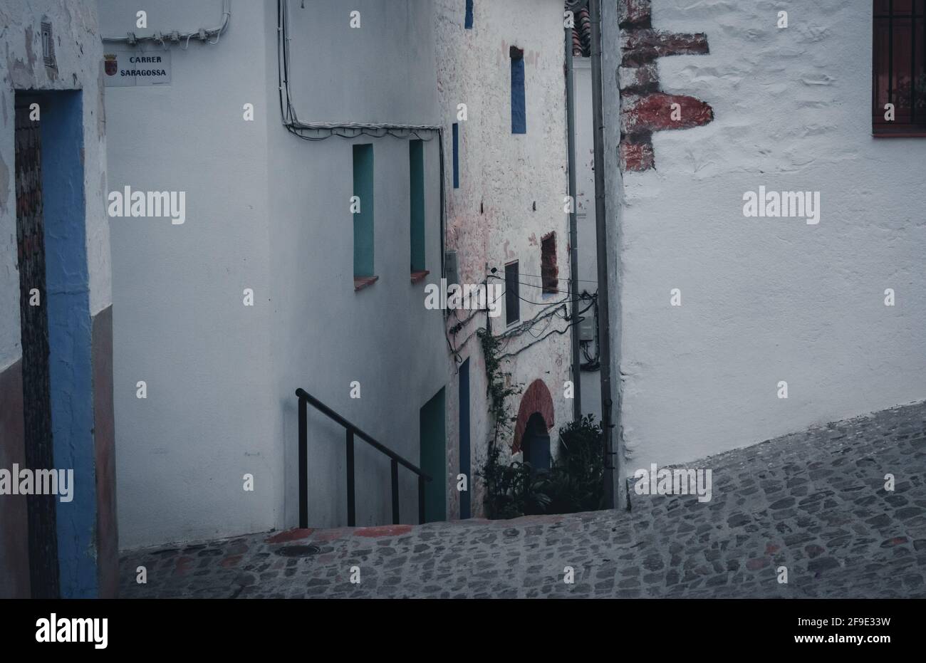 A metastaircase in the Ain, a small town with white buildings in the ...