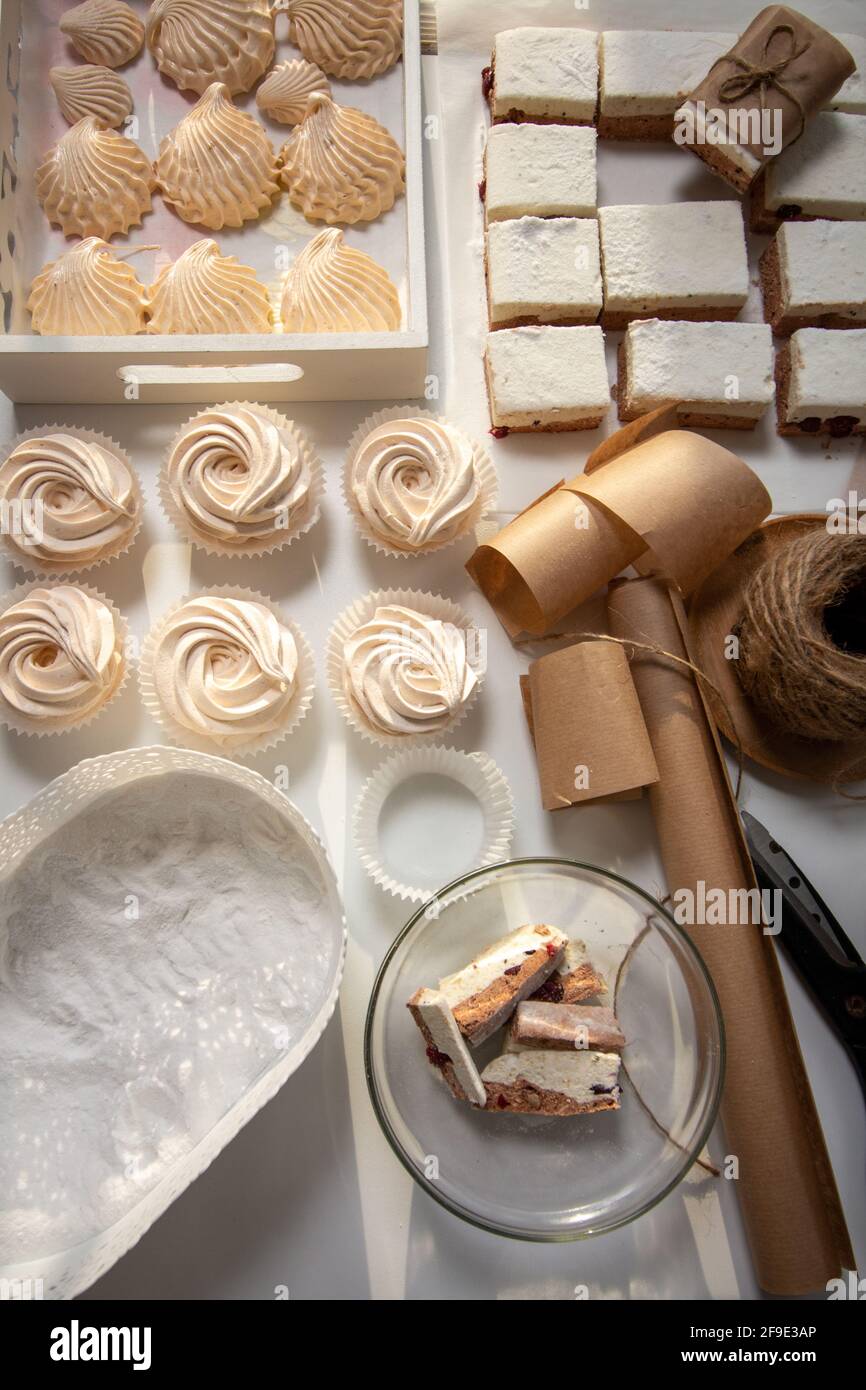 Homemade marshmallows of different shapes and sizes. Spread out on the ...