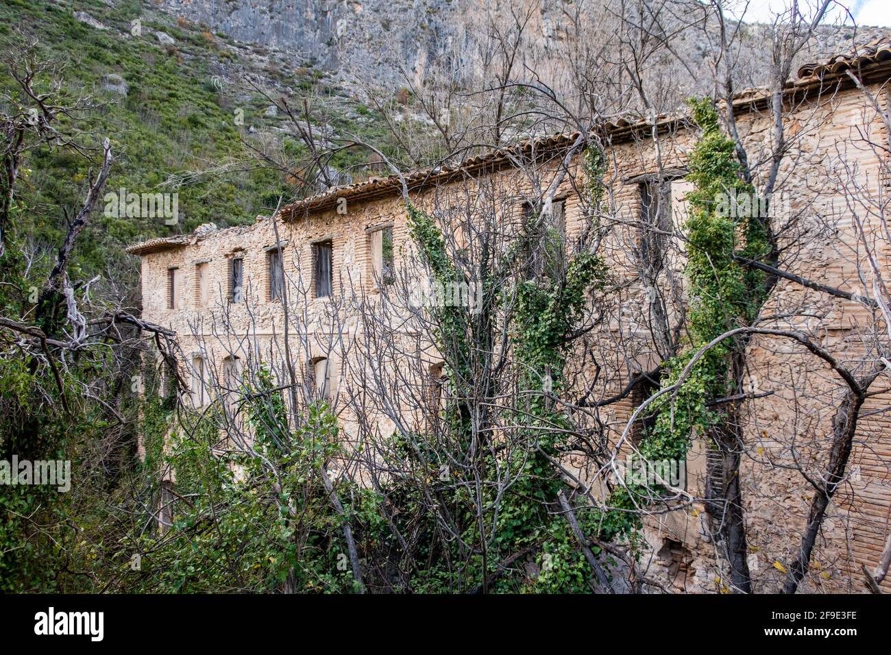 The beautiful view of an old and abandoned building captured behind the ...