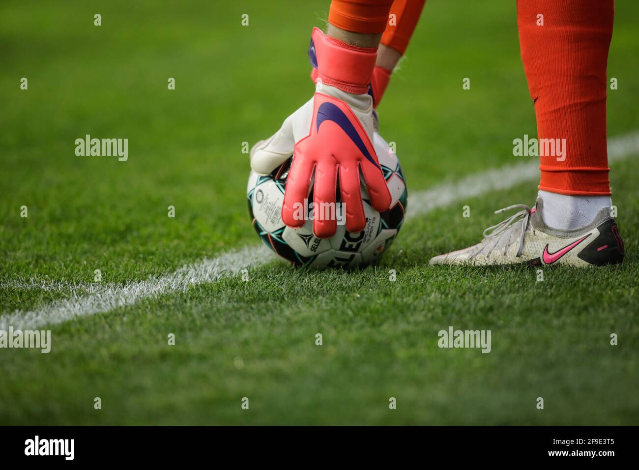 Grabbing ball with foot hi-res stock photography and images - Alamy