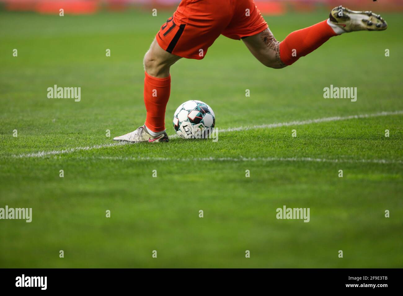 Kicking a ball hi-res stock photography and images - Alamy