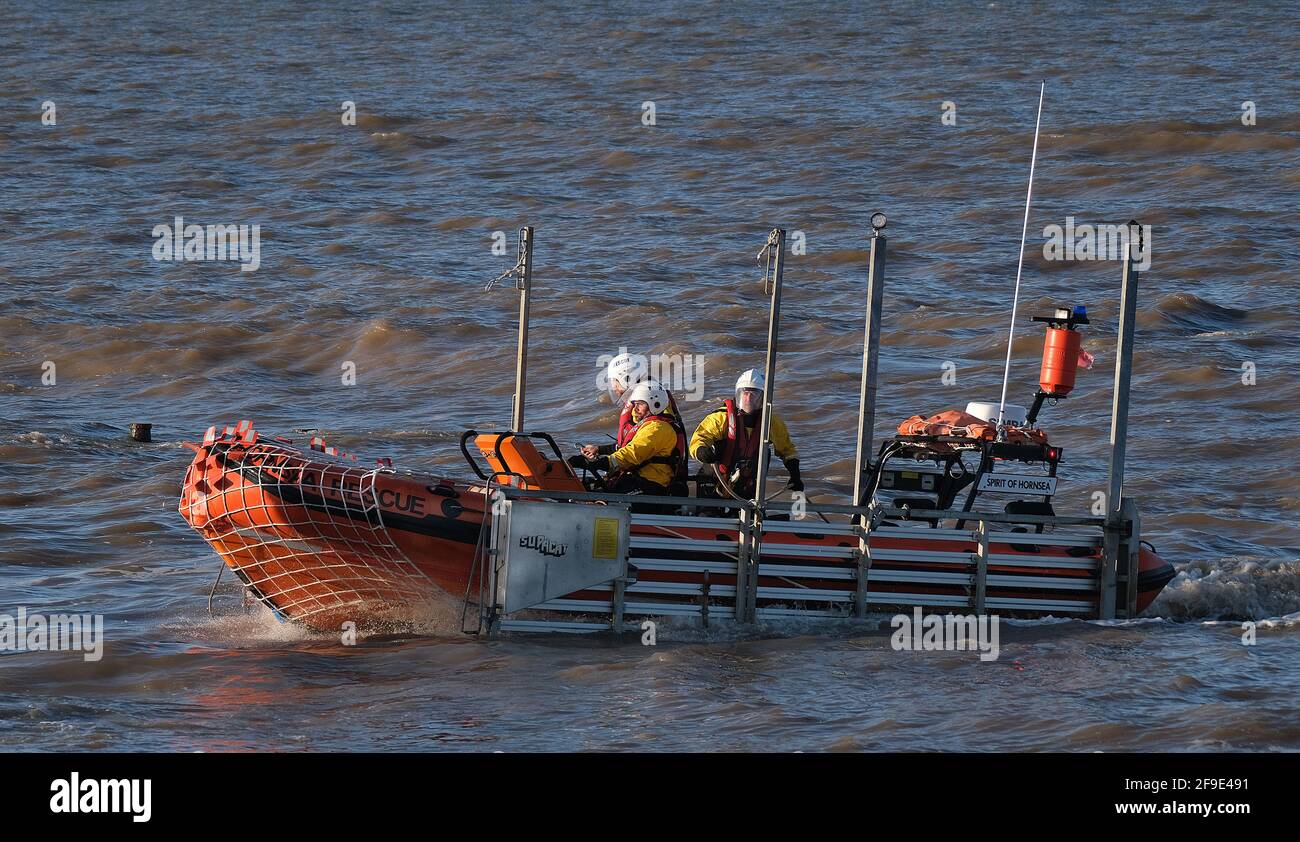 Inshore rescue boat crew on exercise at Hornsea, east Yorkshire. UK ...