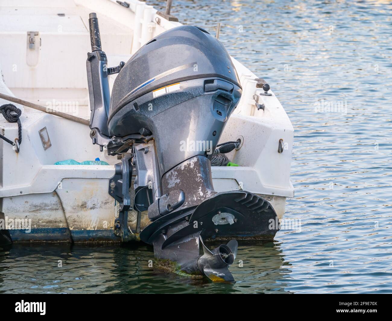 Close up with an worn out motor boat engine Stock Photo - Alamy
