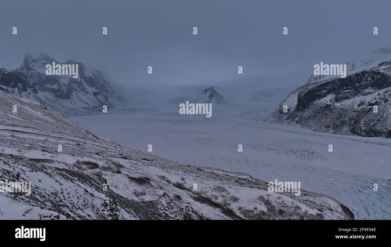 Road in snow cap mountains hi-res stock photography and images - Alamy