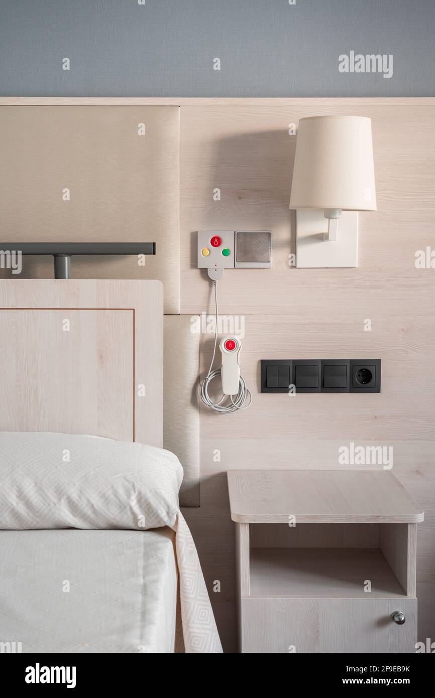 Nurse call system with emergency buttons installed near bed in medical ...
