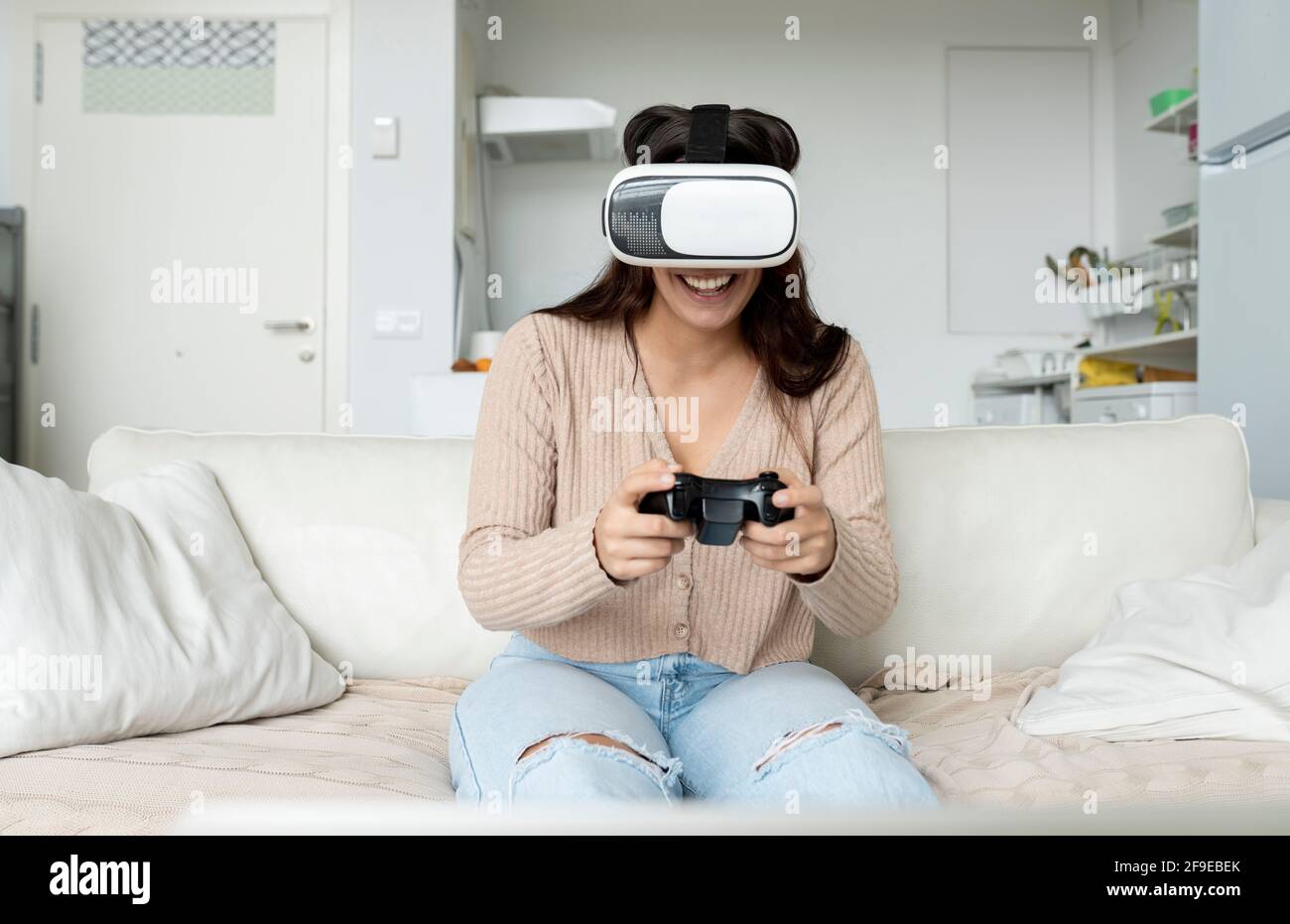 Vr gamer couch hi-res stock photography and images - Alamy