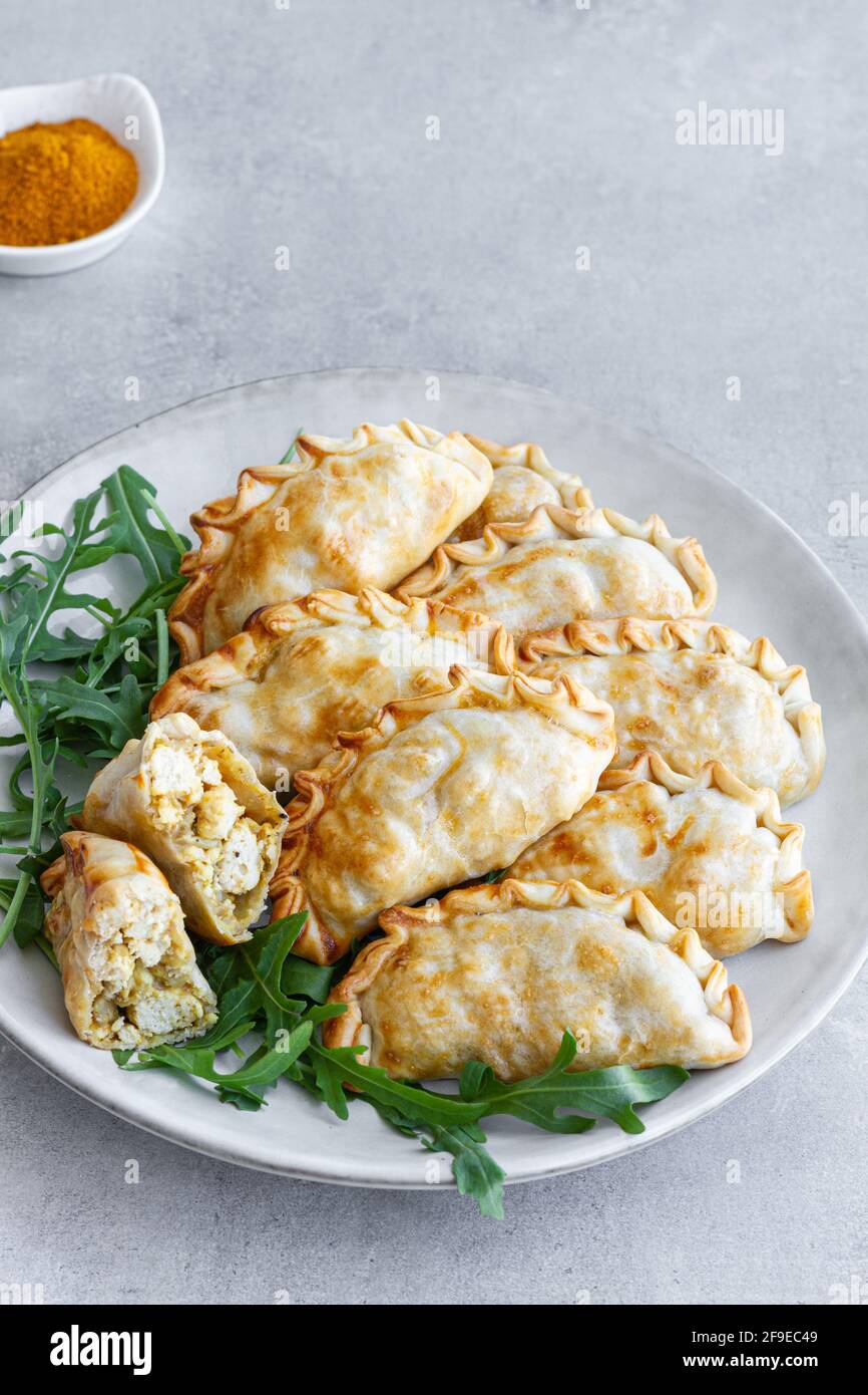 Top view of delicious plate of chicken curry turnovers Stock Photo - Alamy