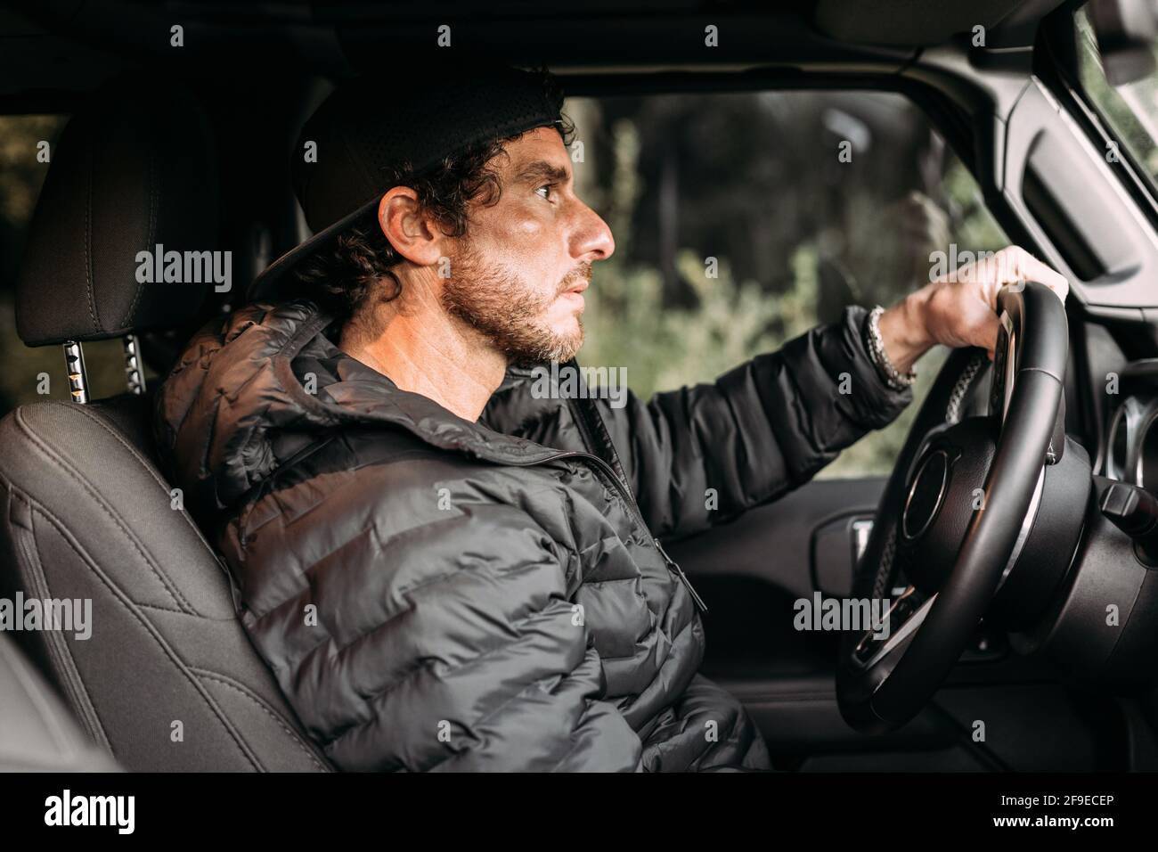 Man Driving Car Side View