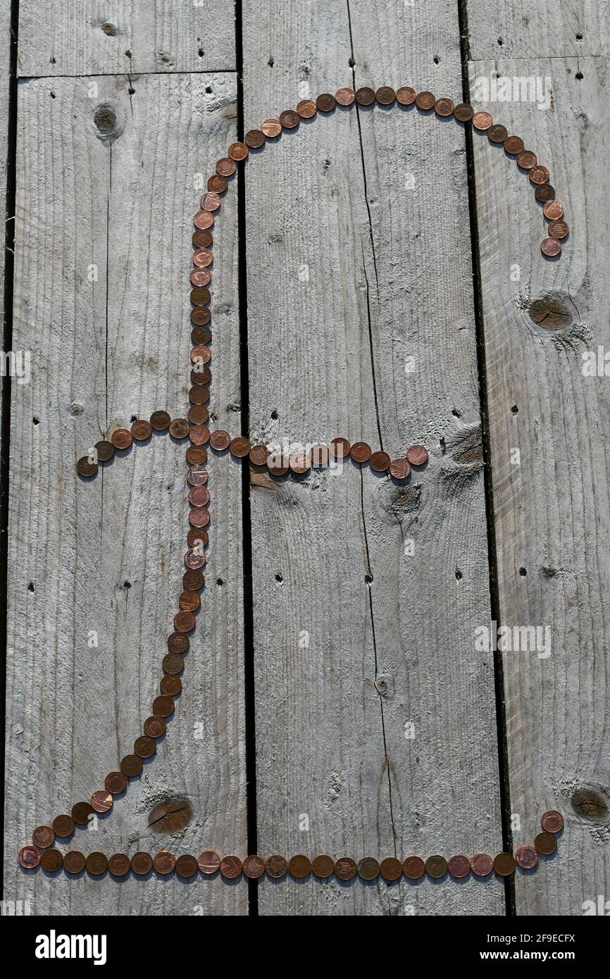 Sterling One Pound of Pennies, in the shape of the Sterling symbol ...