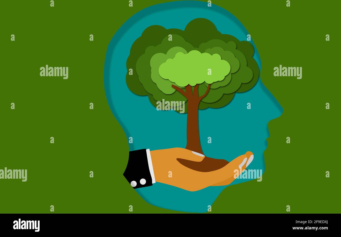 An environmentalist concept with a tree in human's mind on a green ...