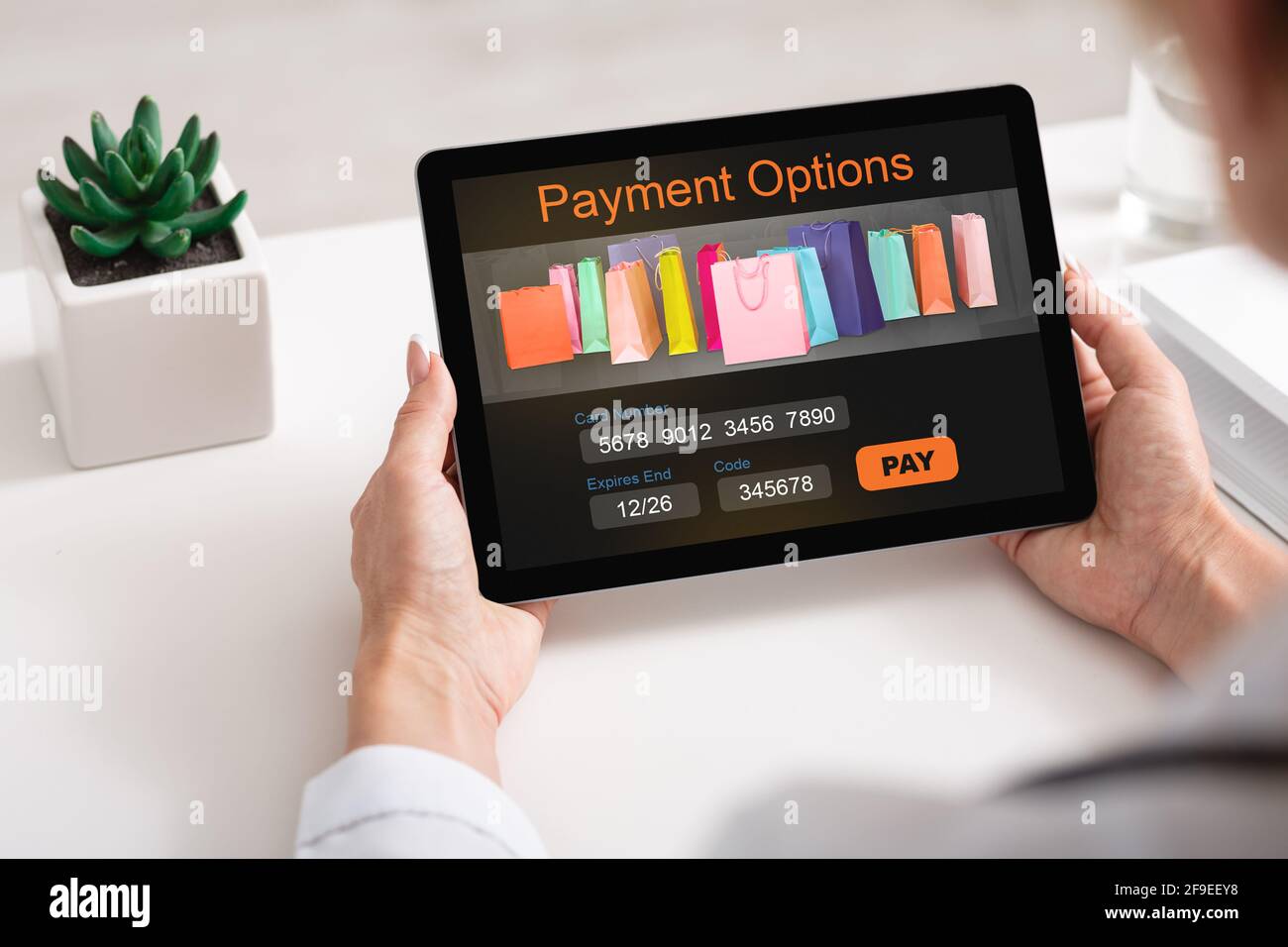 Digital payment female hi-res stock photography and images - Alamy