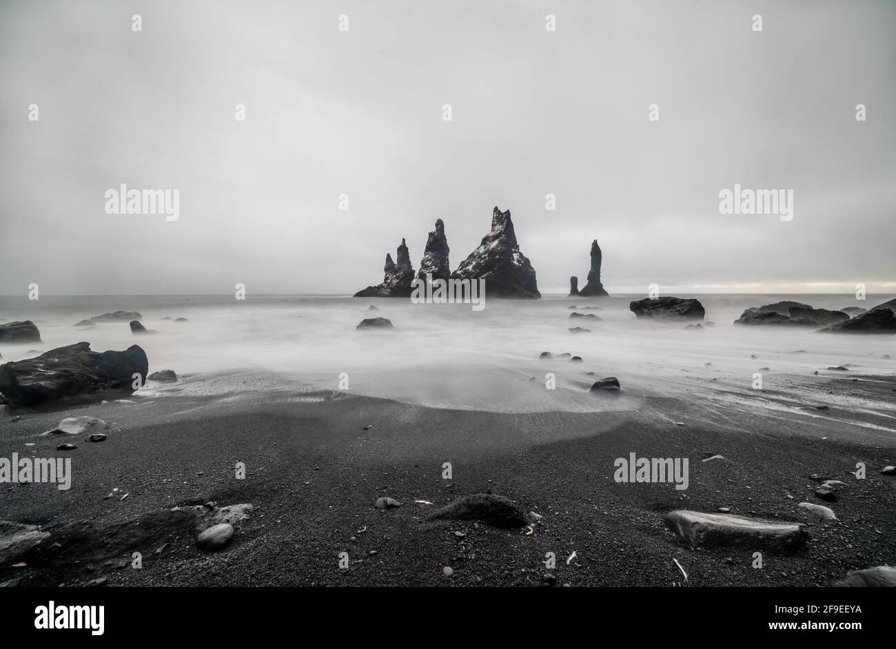 Basalt rock formations Troll toes on black beach. at storm ...
