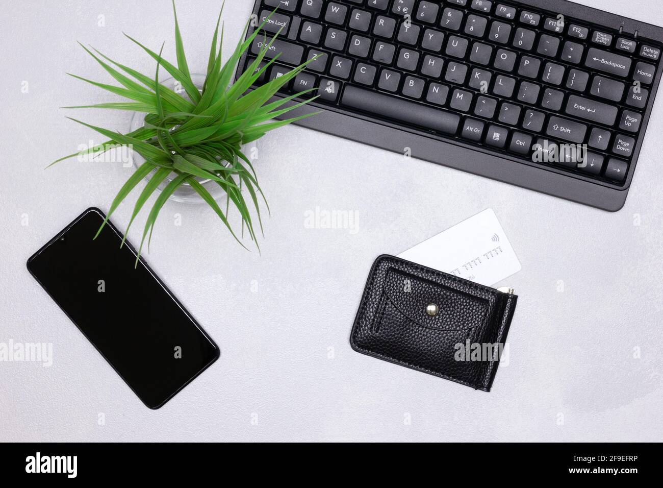 Internet shopping, online payments concept. Keyboard, smartphone ...