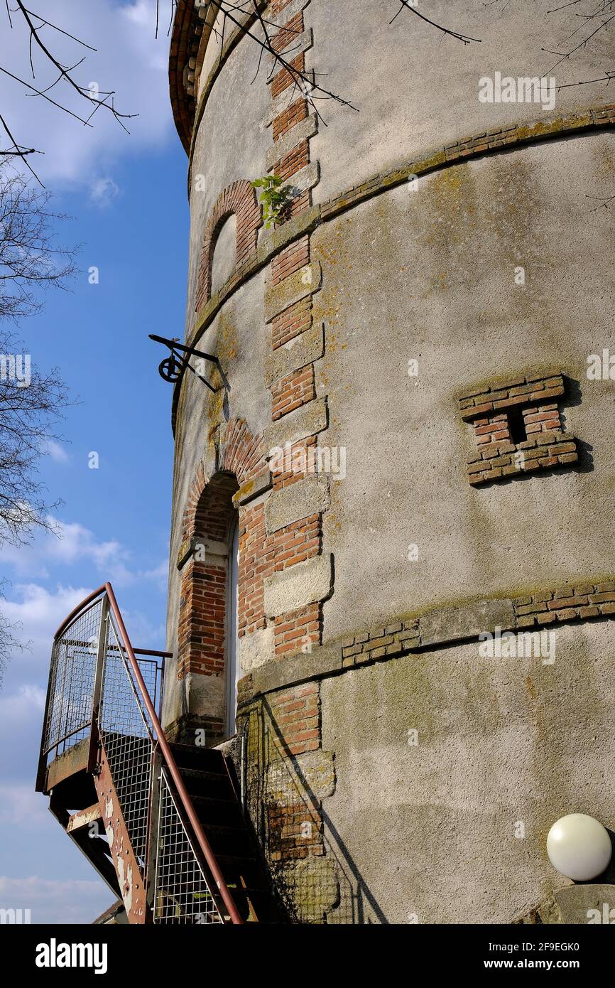 A dovecote tower that houses pigeons in a small city in France Stock ...