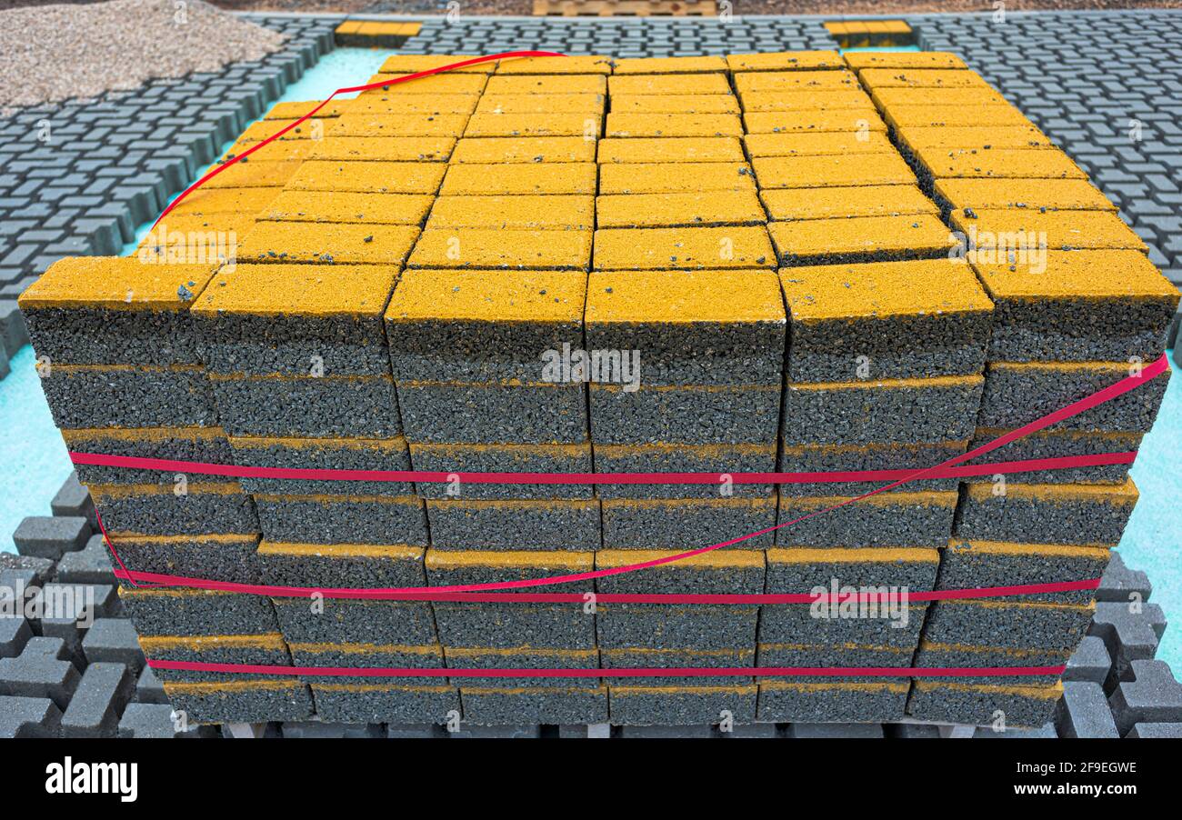 Stacks of interlocking stones for installing driveway landscaping Stock ...