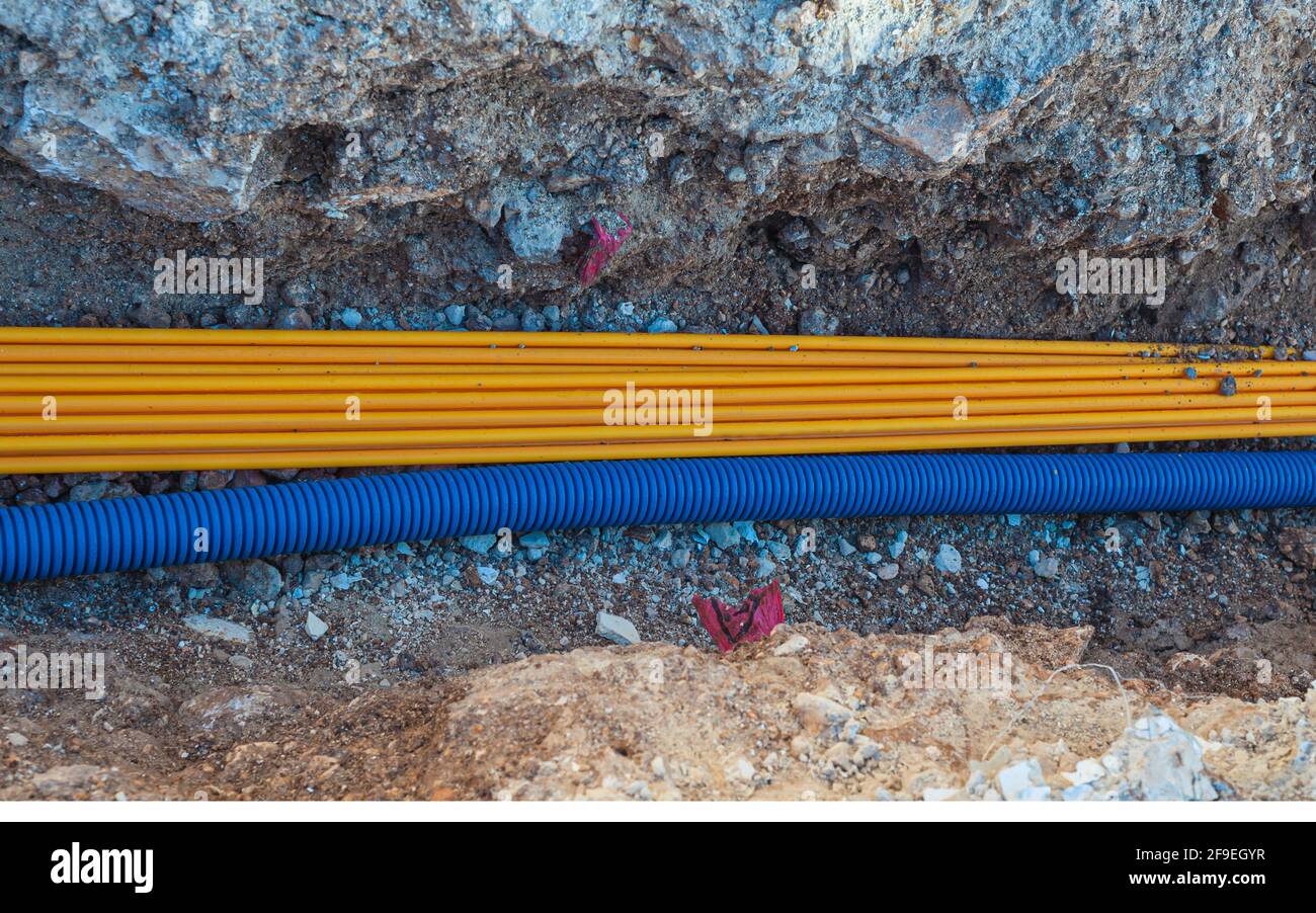 laying of communications, supply of water and electricity to buildings ...