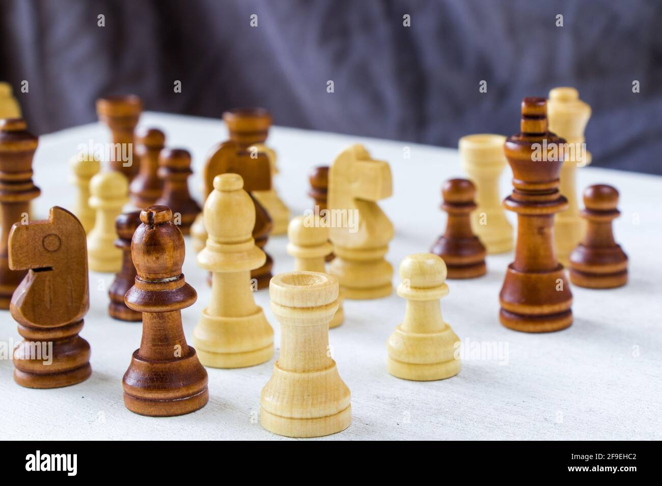 A selective focus shot of wooden chess figures on a white table Stock ...