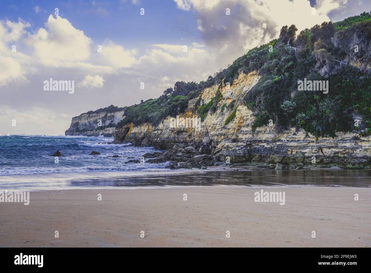 Limestone cliffs over ocean waves in Australia Stock Photo - Alamy