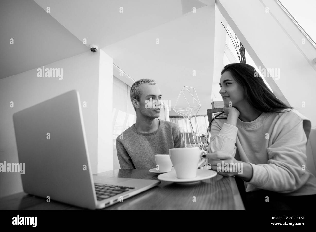 Spending time coffee shop Black and White Stock Photos & Images - Alamy