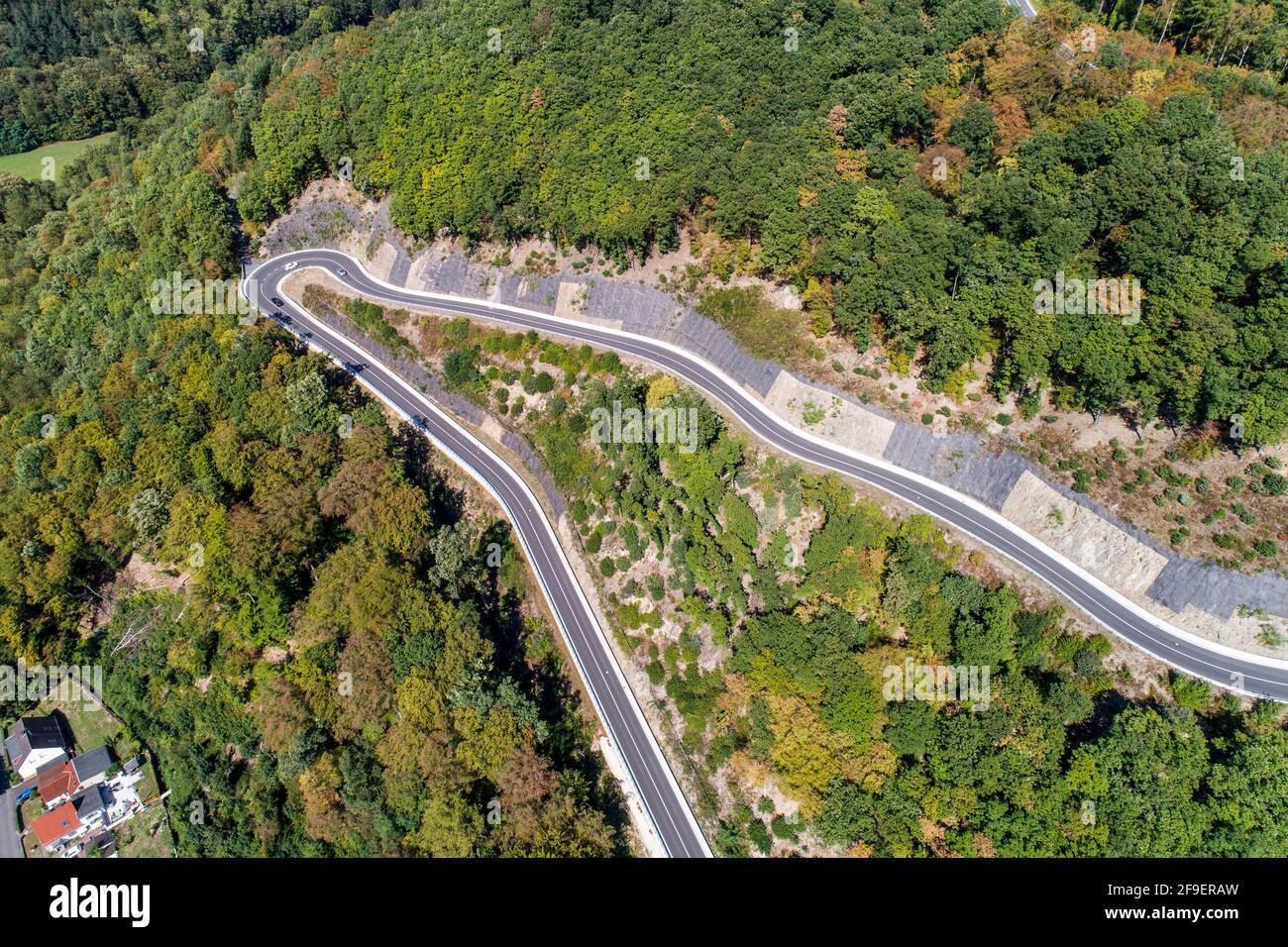 Winding road serpentine from a high mountain pass in the rhine village ...